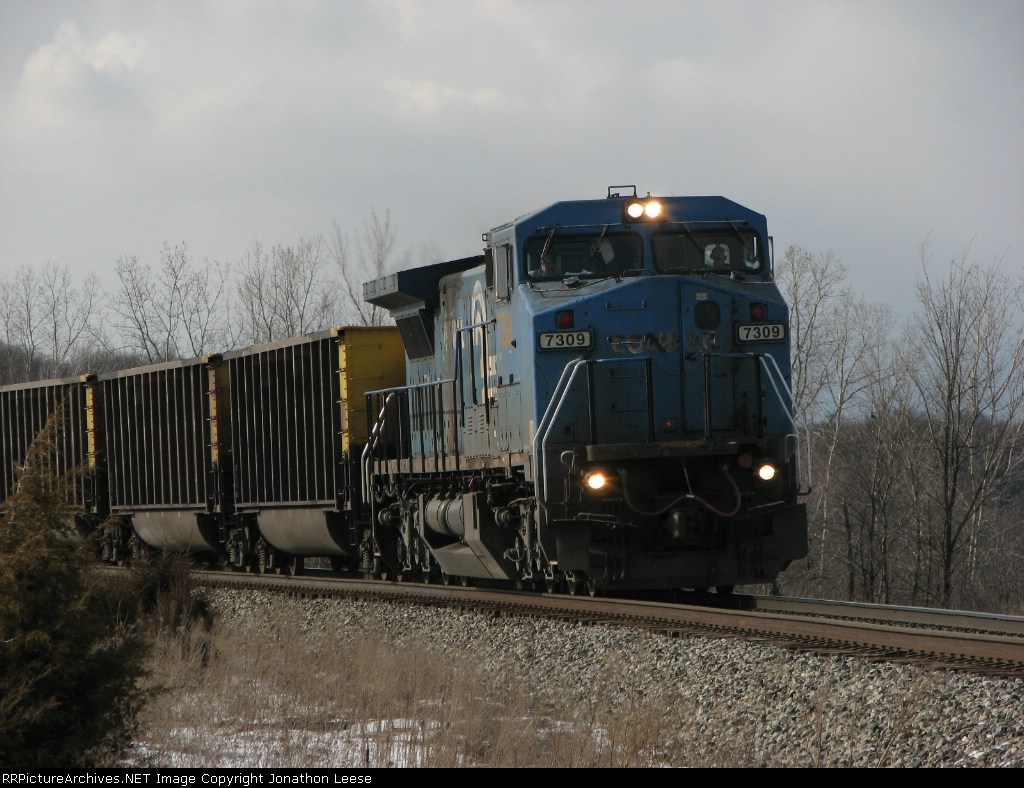 CSX 7309 leads E446-23 east